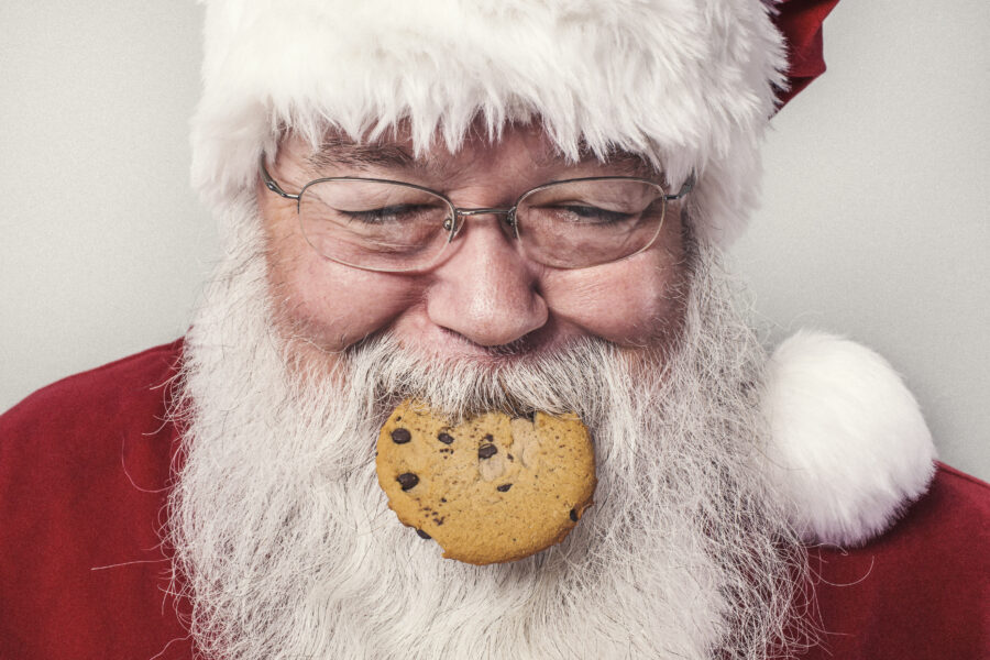 Santa Clause Eating Cookie Royalty Free HD Stock Photo and Image